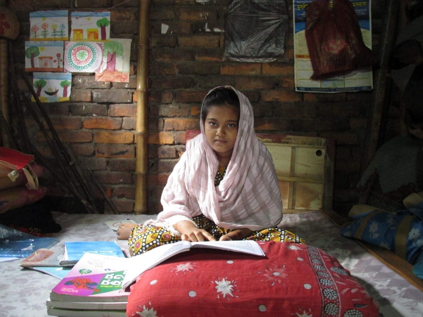 Lazina swaps toiling in umbrella factory for study books and school ...